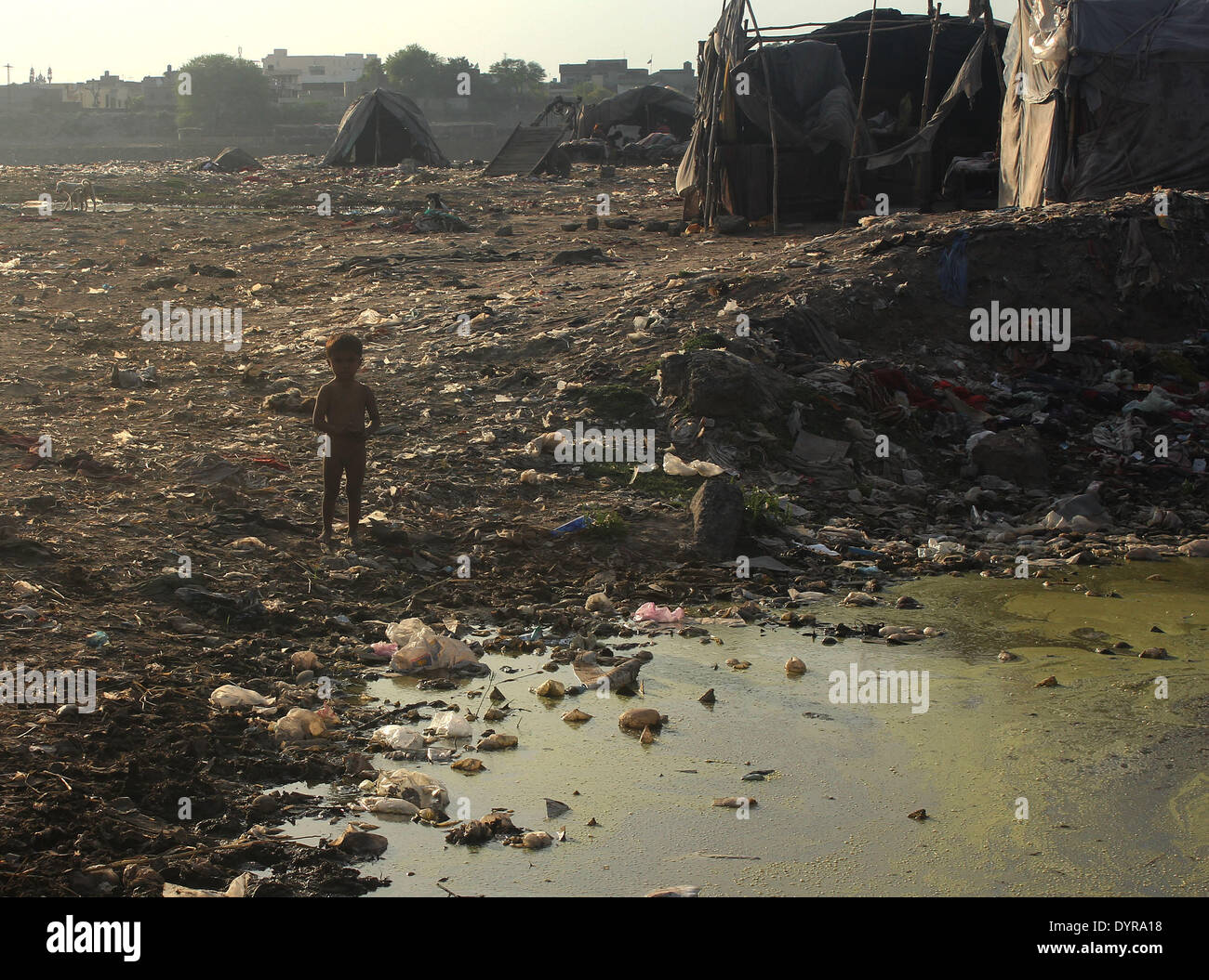 LAHORE, PAKISTAN, APRIL 24: Pakistani gypsy children playing in the dry ...