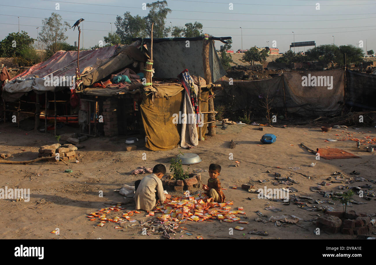 LAHORE, PAKISTAN, APRIL 24: Pakistani gypsy children playing in the dry ...