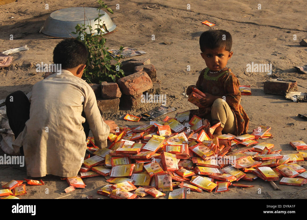 LAHORE, PAKISTAN, APRIL 24: Pakistani gypsy children playing in the dry ...