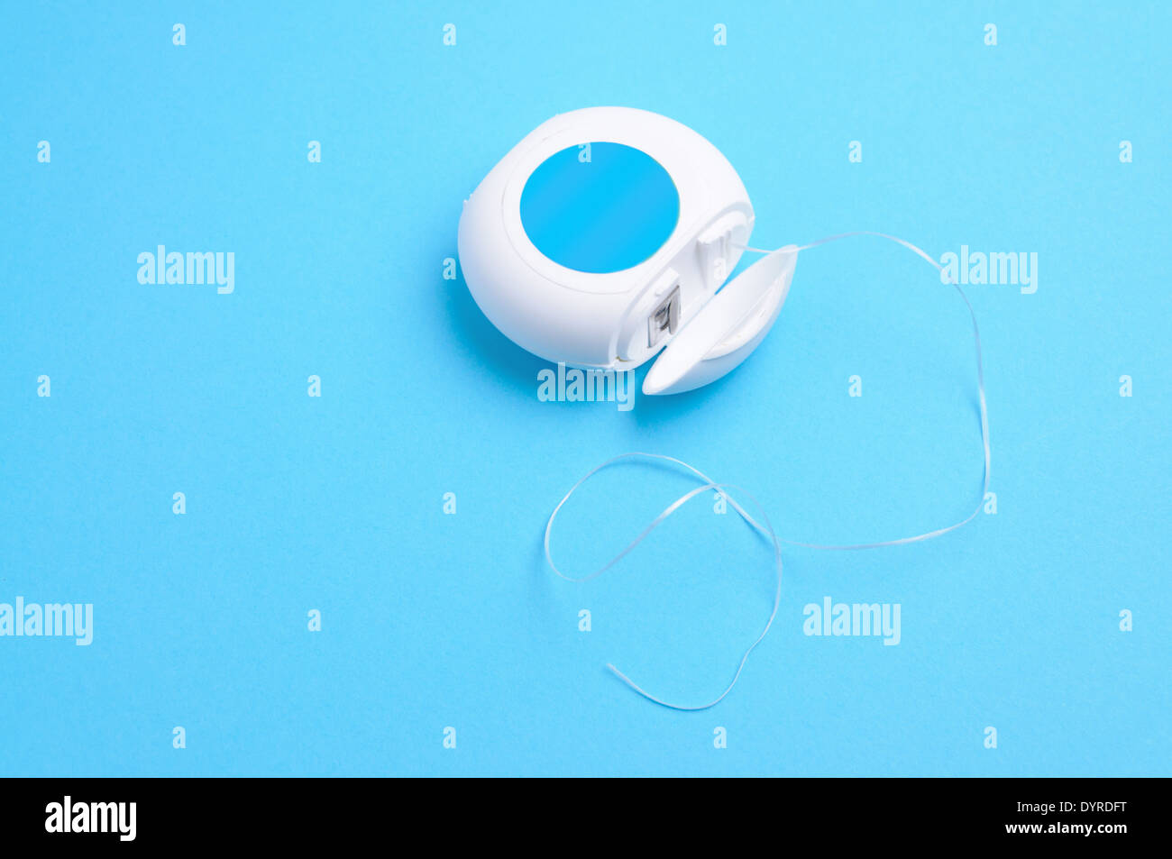Dental floss on white hi-res stock photography and images - Alamy
