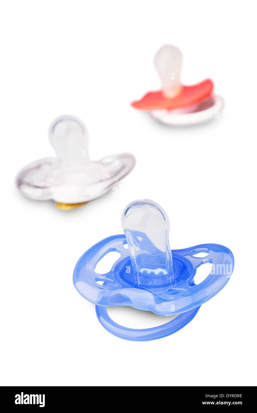 Different Baby dummies isolated over white Stock Photo - Alamy
