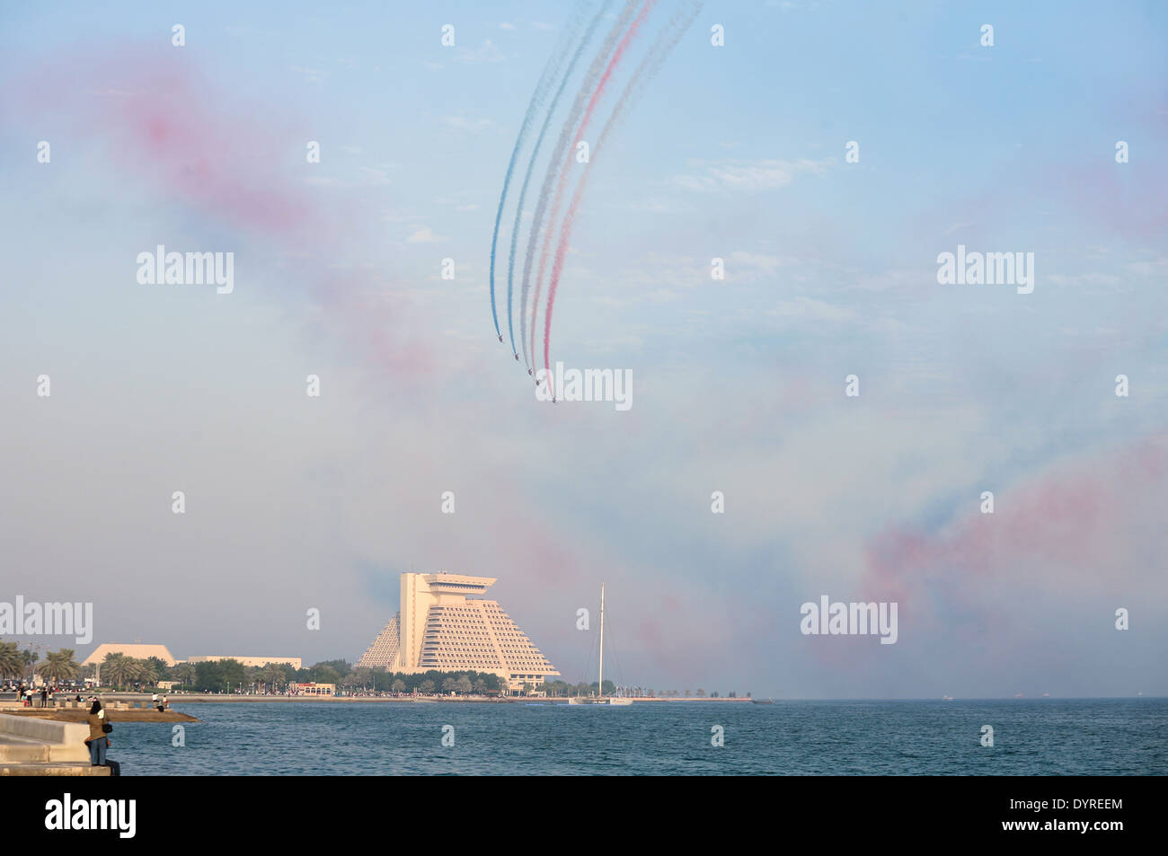 DOHA, QATAR - NOVEMBER18, 2007: Crowds throng Doha's Corniche during a ...