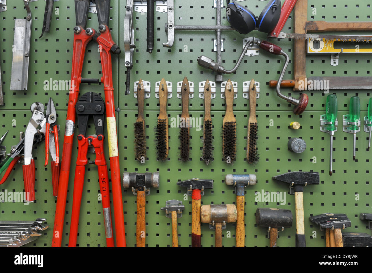 Tools hanging on a wall, 2012 Stock Photo - Alamy
