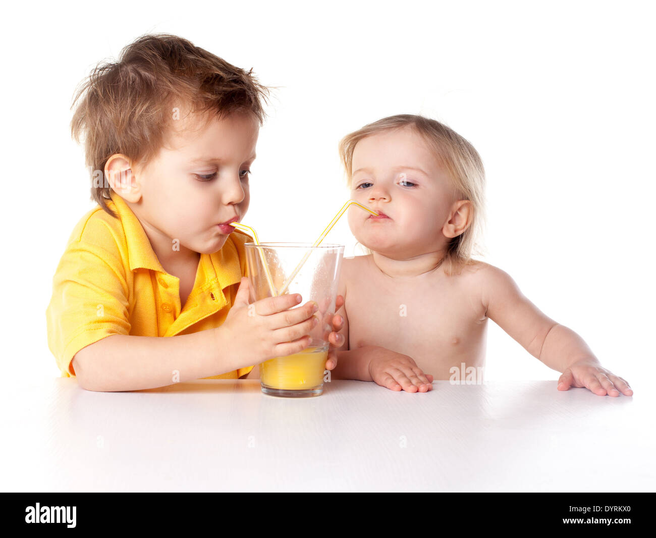 small children drinking juice Stock Photo - Alamy