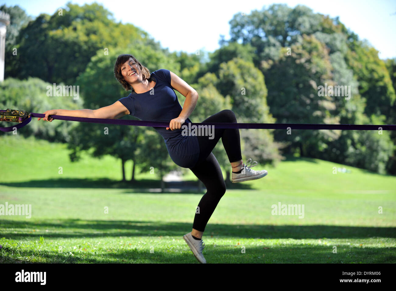 Slackliner Faith Dickey in the English Garden in Munich, 2012 Stock ...