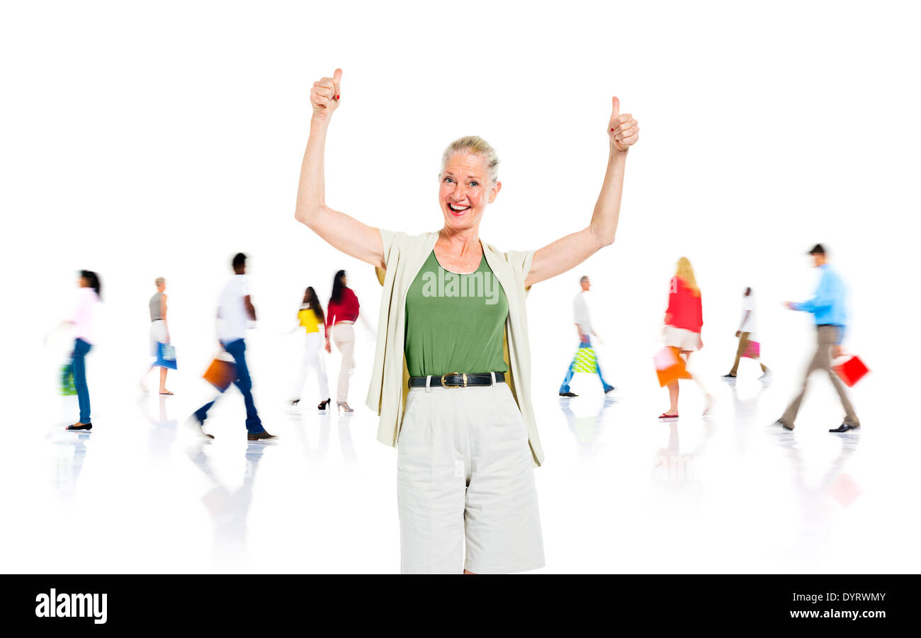 A Cheerful Woman in a Busy and Blurry Background Stock Photo - Alamy
