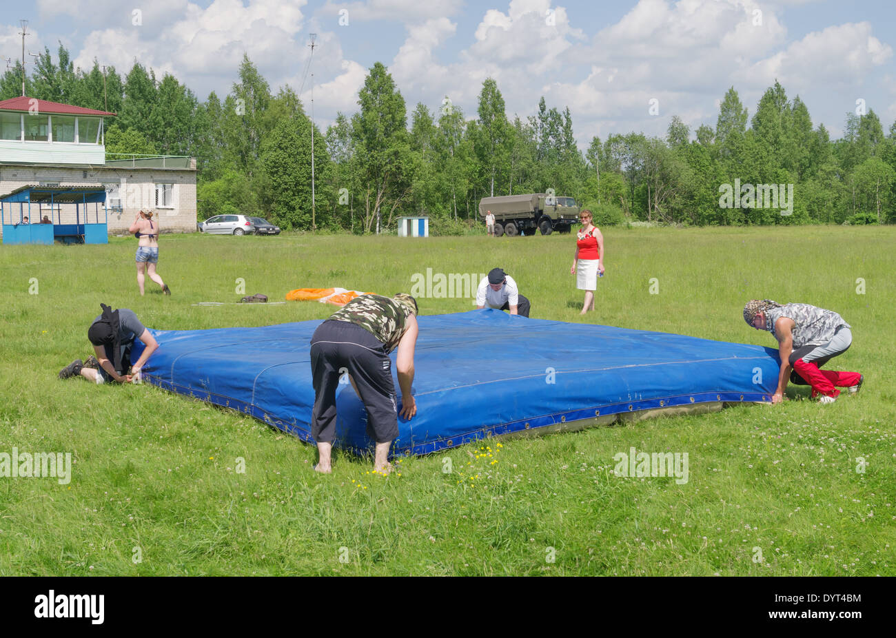 One day with parachutist in airfield. Mat placement for an electronic ...