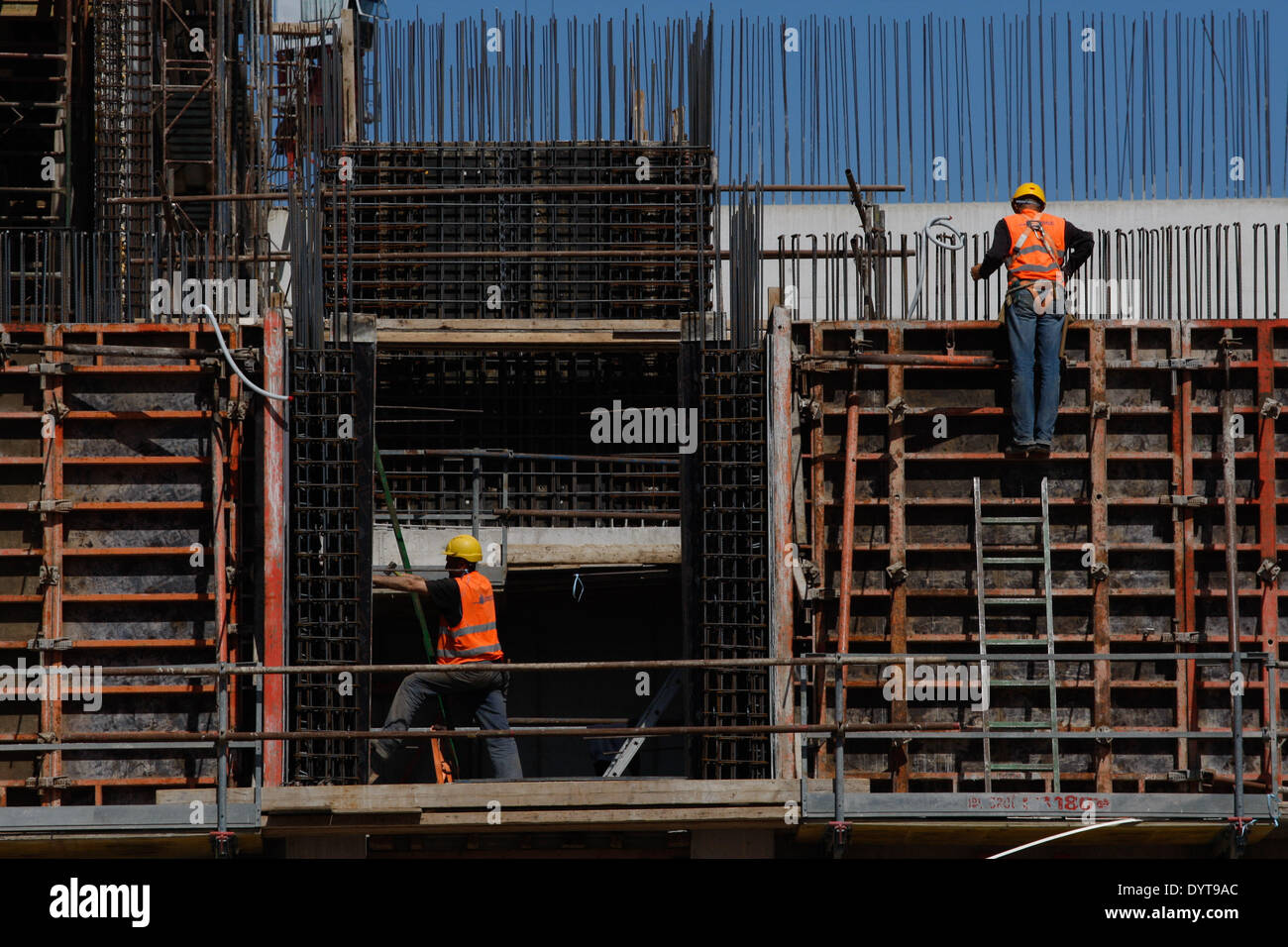 Athens, Greece. 25th Apr, 2014. Workers install medal rods at the ...