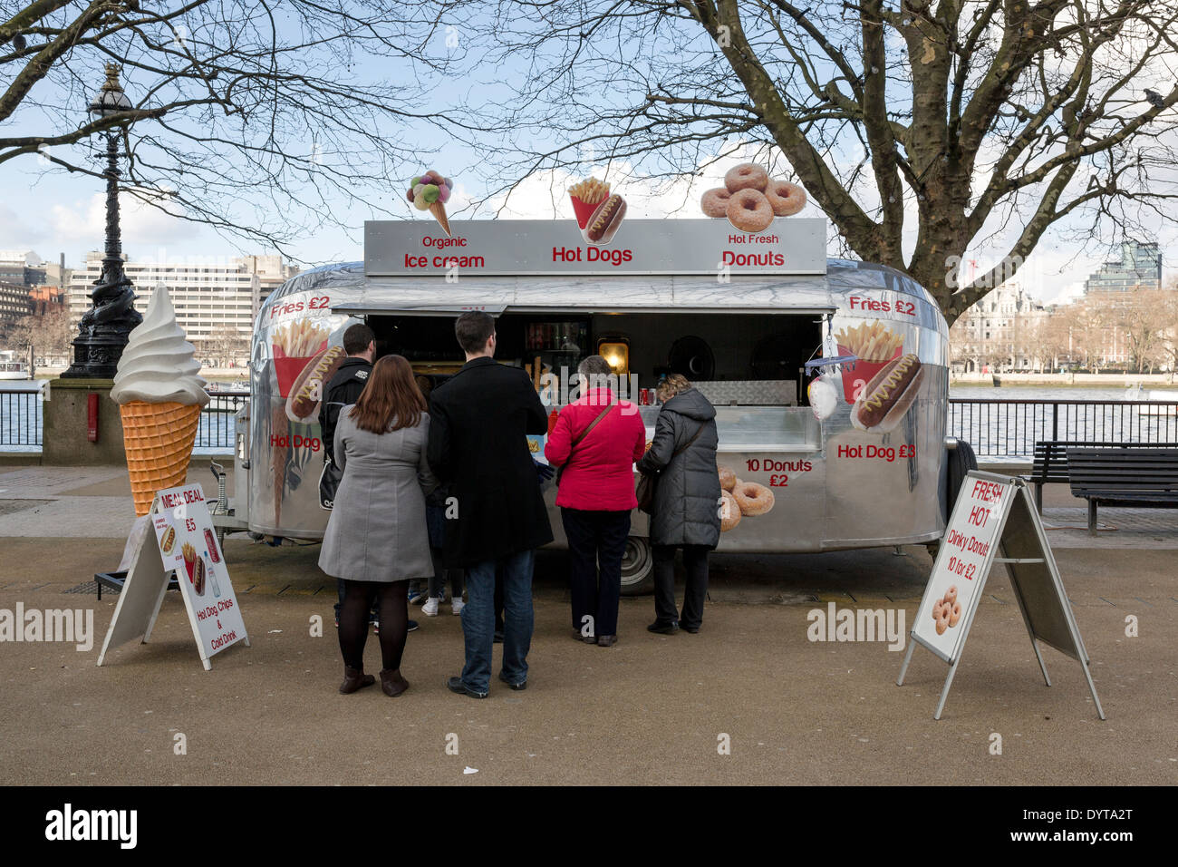 Customers wait in front of a canteen at bankside area in South Bank ...