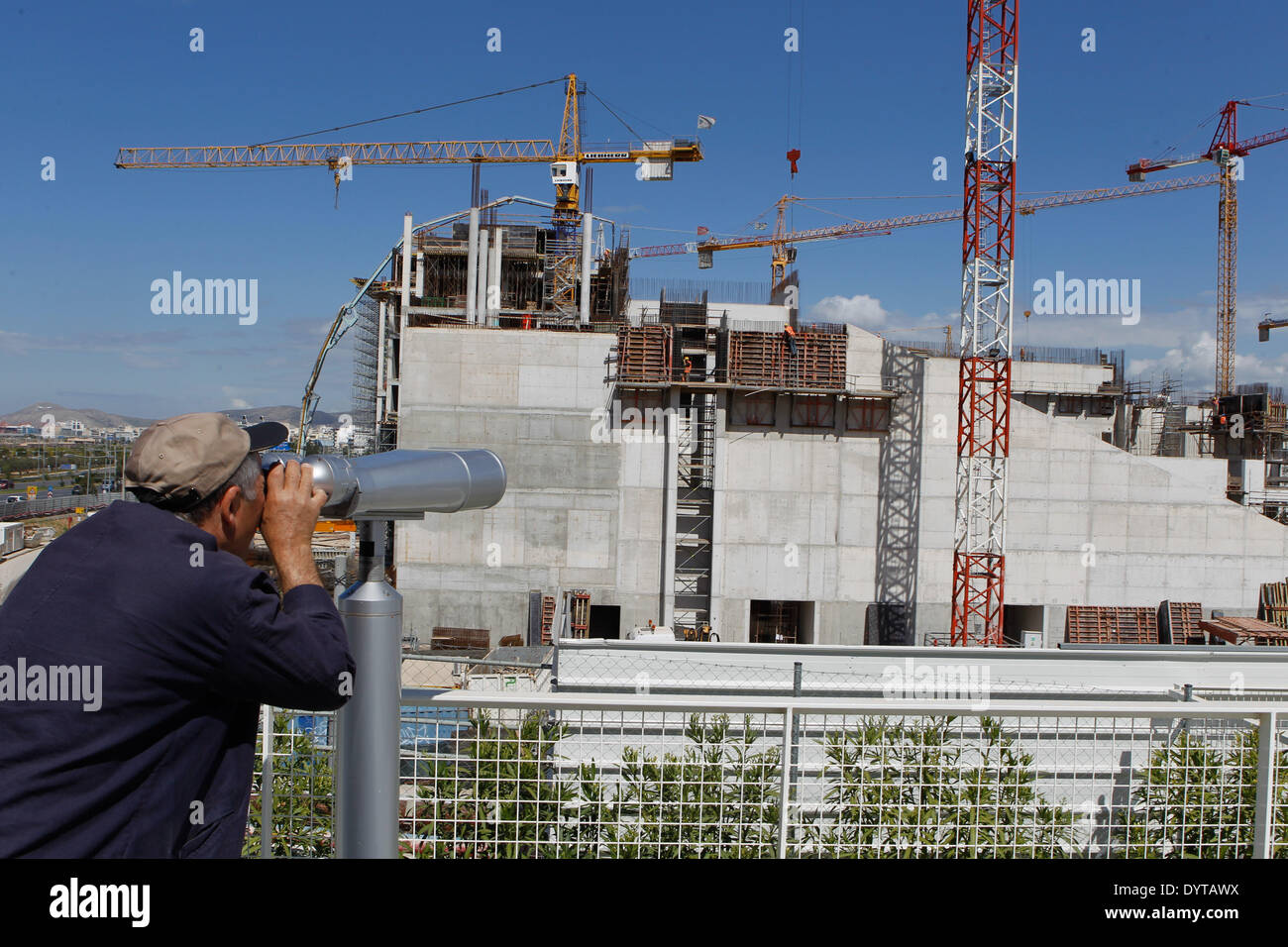 Athens, Greece. 25th Apr, 2014. Cranes operate at the construction site ...