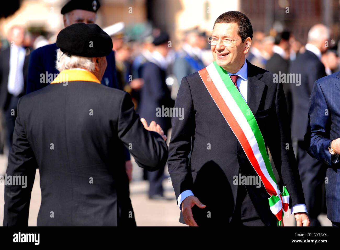 Rome, Italy. 25th Apr, 2014. Rome's Mayor Ignazio Marino (R) attends ...