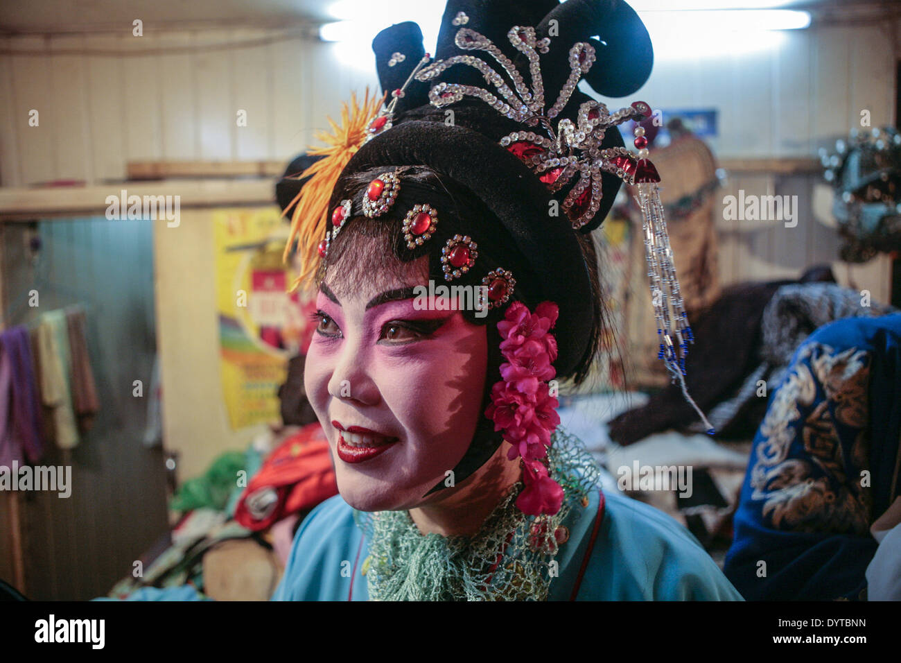 Chinese traditional opera artists pose for a picture before their daily ...