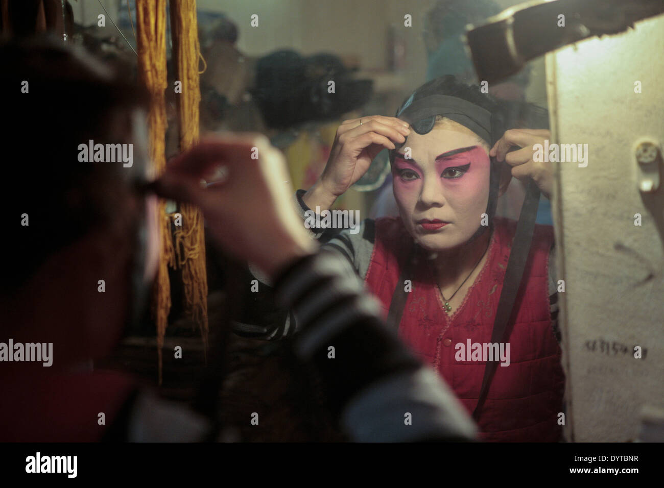 Chinese traditional opera artists do their makeup before their daily ...