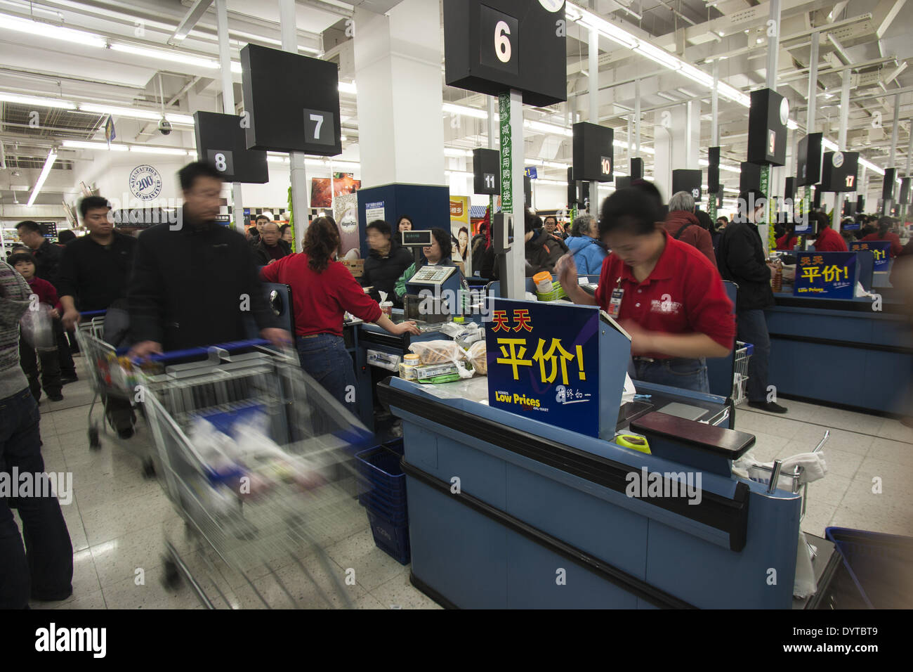 Customers pay at cashier of a Walmart store in Beijing Stock Photo - Alamy