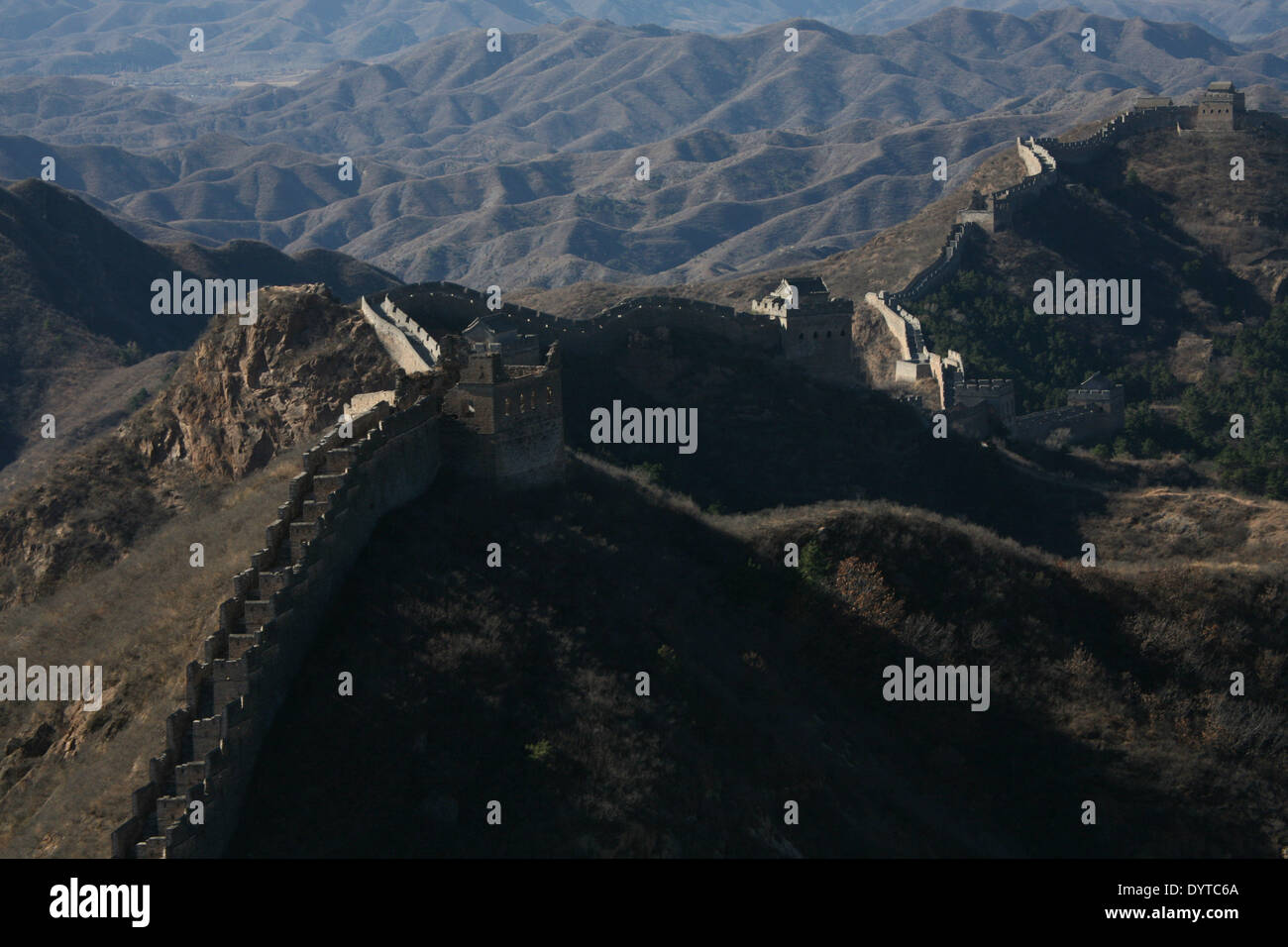 Visitors walk on the broken Jin Shan Lin section of Great Wall at the ...