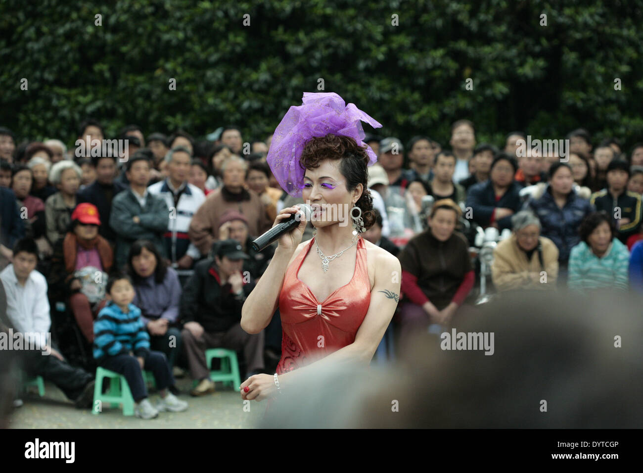 A performance group made up of all male performer dressed as woman Stock Photo - Alamy