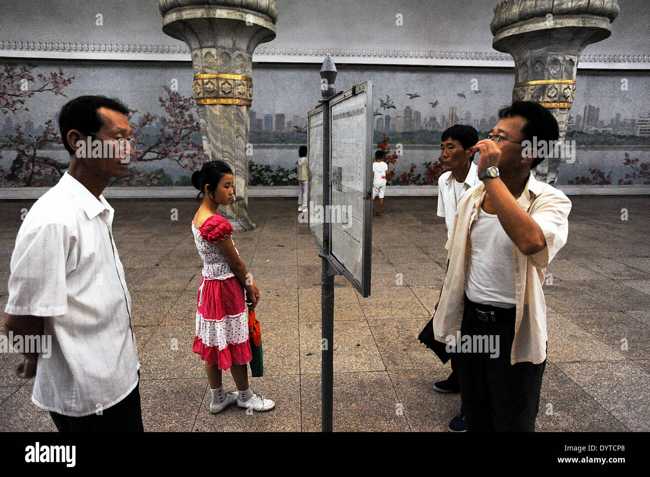 Commuters reading newspapers on train hi-res stock photography and ...
