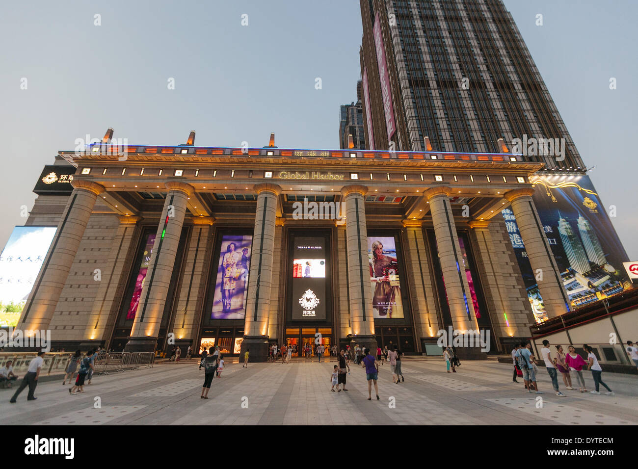 People walk outside the Global Harbor Stock Photo - Alamy