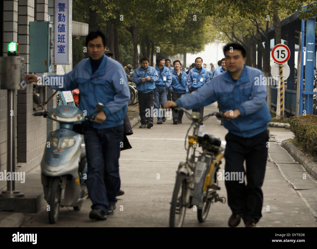 Workers leave factory hi-res stock photography and images - Alamy