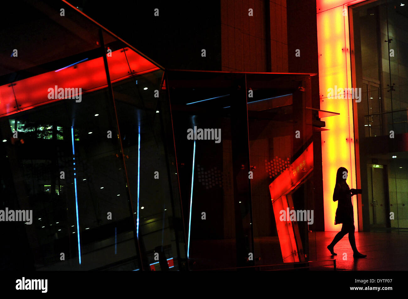 Woman seen walking red hi-res stock photography and images - Alamy