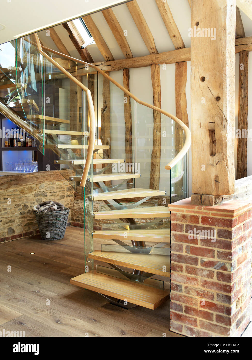 Modern staircase in barn conversion with exposed beams, Field Place ...