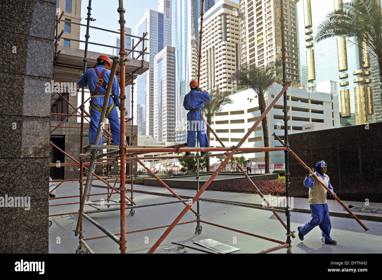 Dubai foreign workers hi-res stock photography and images - Alamy