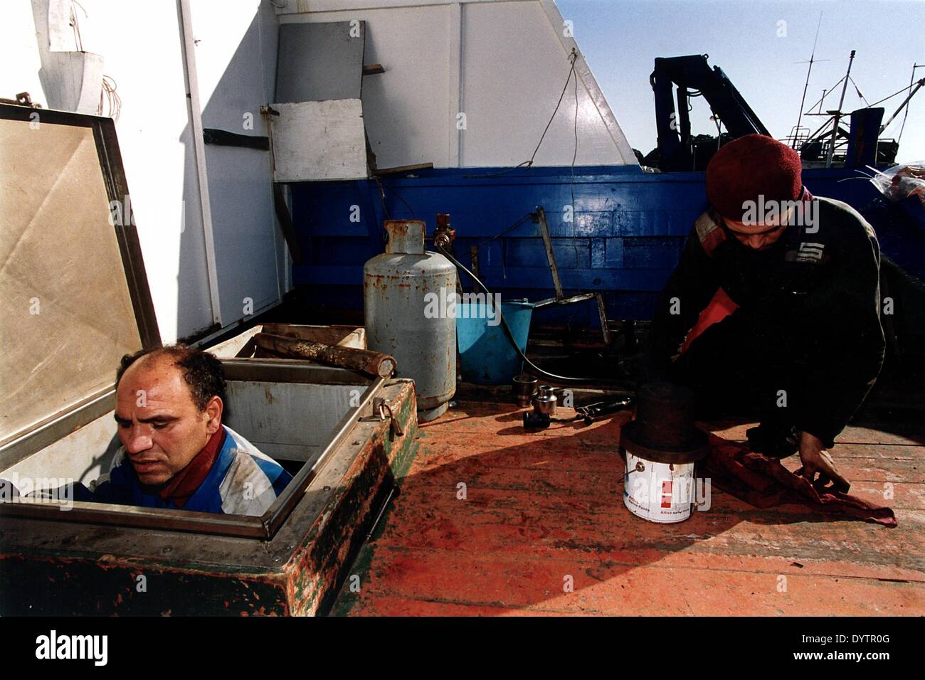 Workers restoring a fishing boat hi-res stock photography and images ...