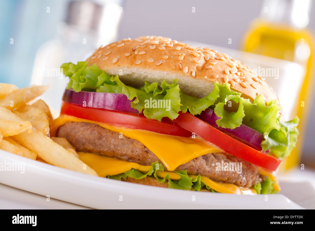 Fast food eat. Burger and French Fries on the plate Stock Photo - Alamy