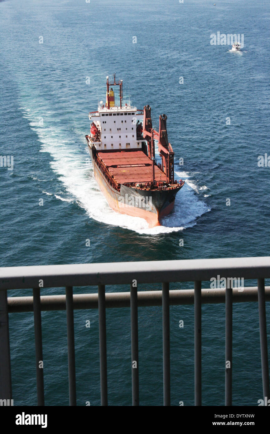 Transport ship crossing under Bosphorus Bridge in Istanbul Stock Photo ...