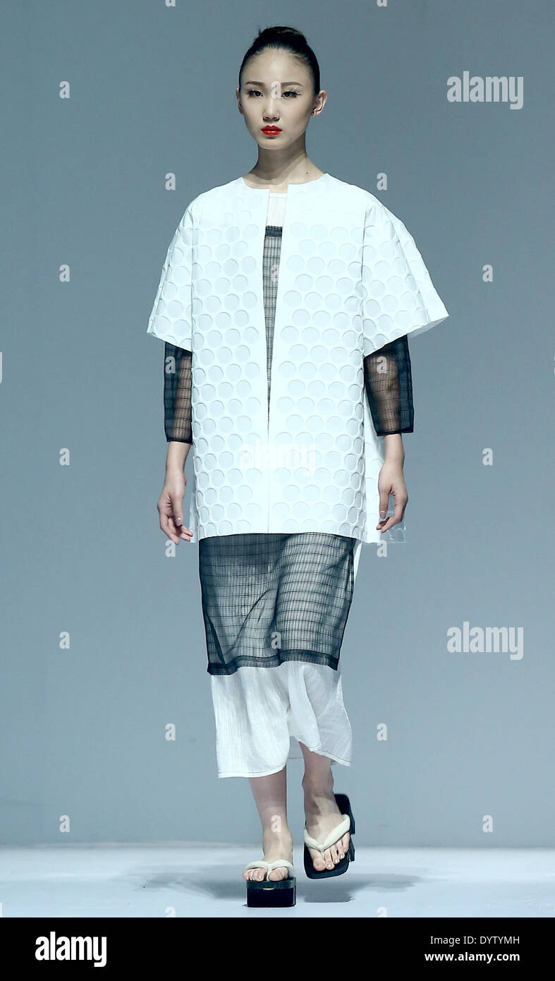 Beijing, China. 25th Apr, 2014. A model presents a creation designed by ...