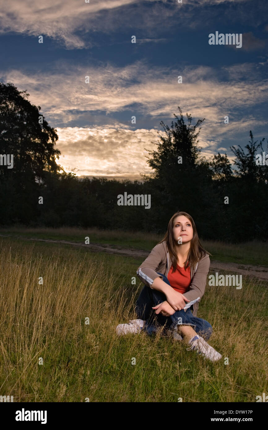 Woman alone outside hi-res stock photography and images - Alamy