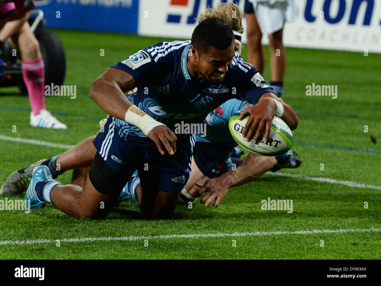 Auckland, New Zealand. 25th Apr, 2014. Lolagi Visinia dives over the ...