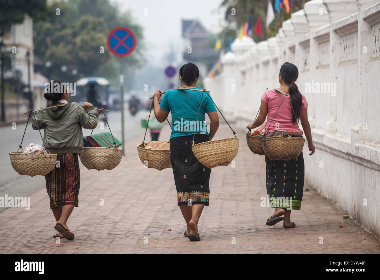 Women street vendor walk on a street hi-res stock photography and ...