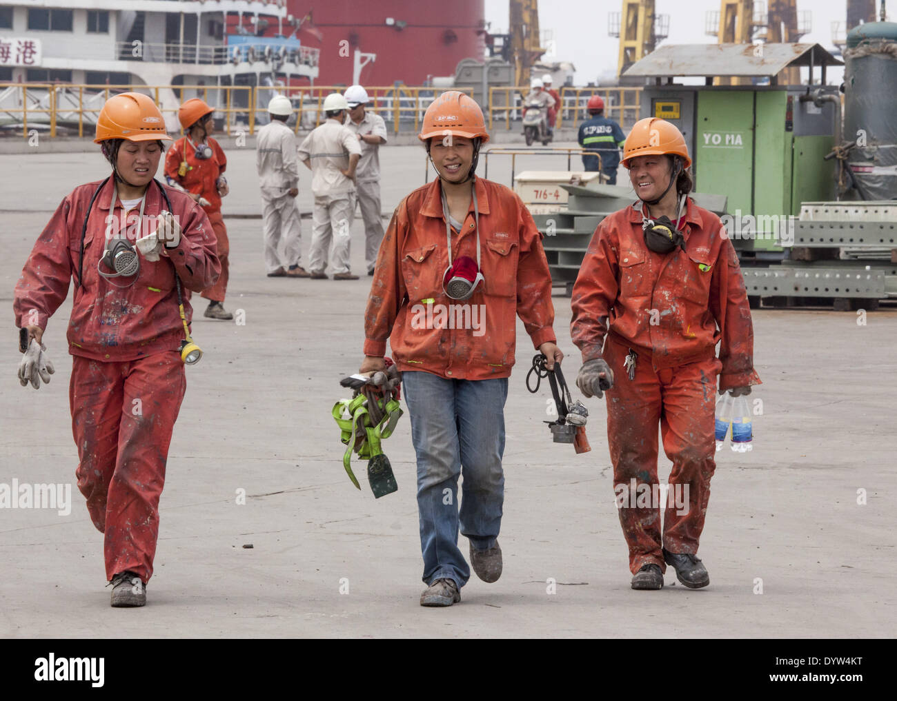 Women workers walk at shipyard of the Shanghai Zhenhua Heavy Industry ...