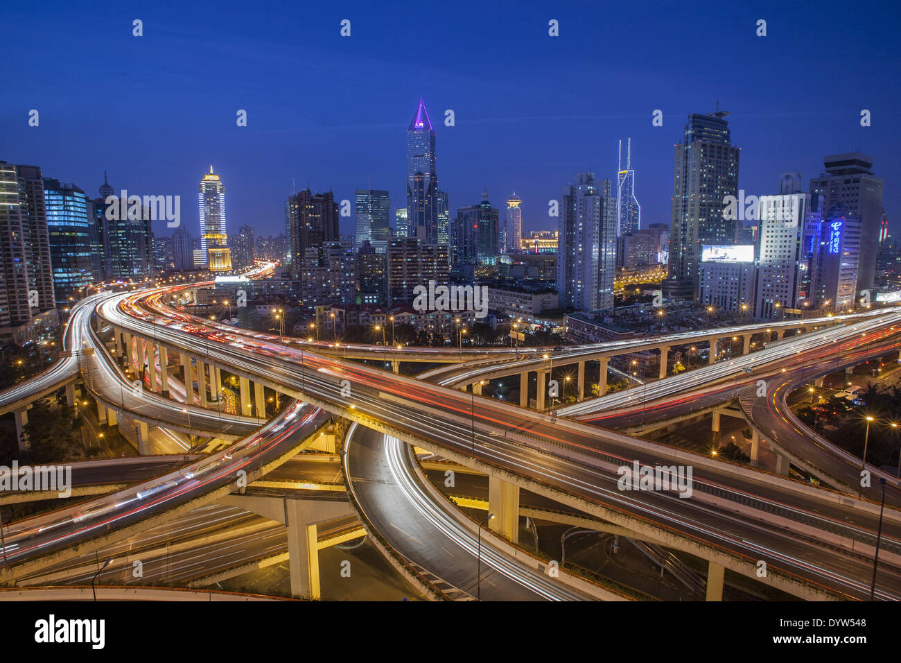 Traffic flow at night at downtown area hi-res stock photography and ...