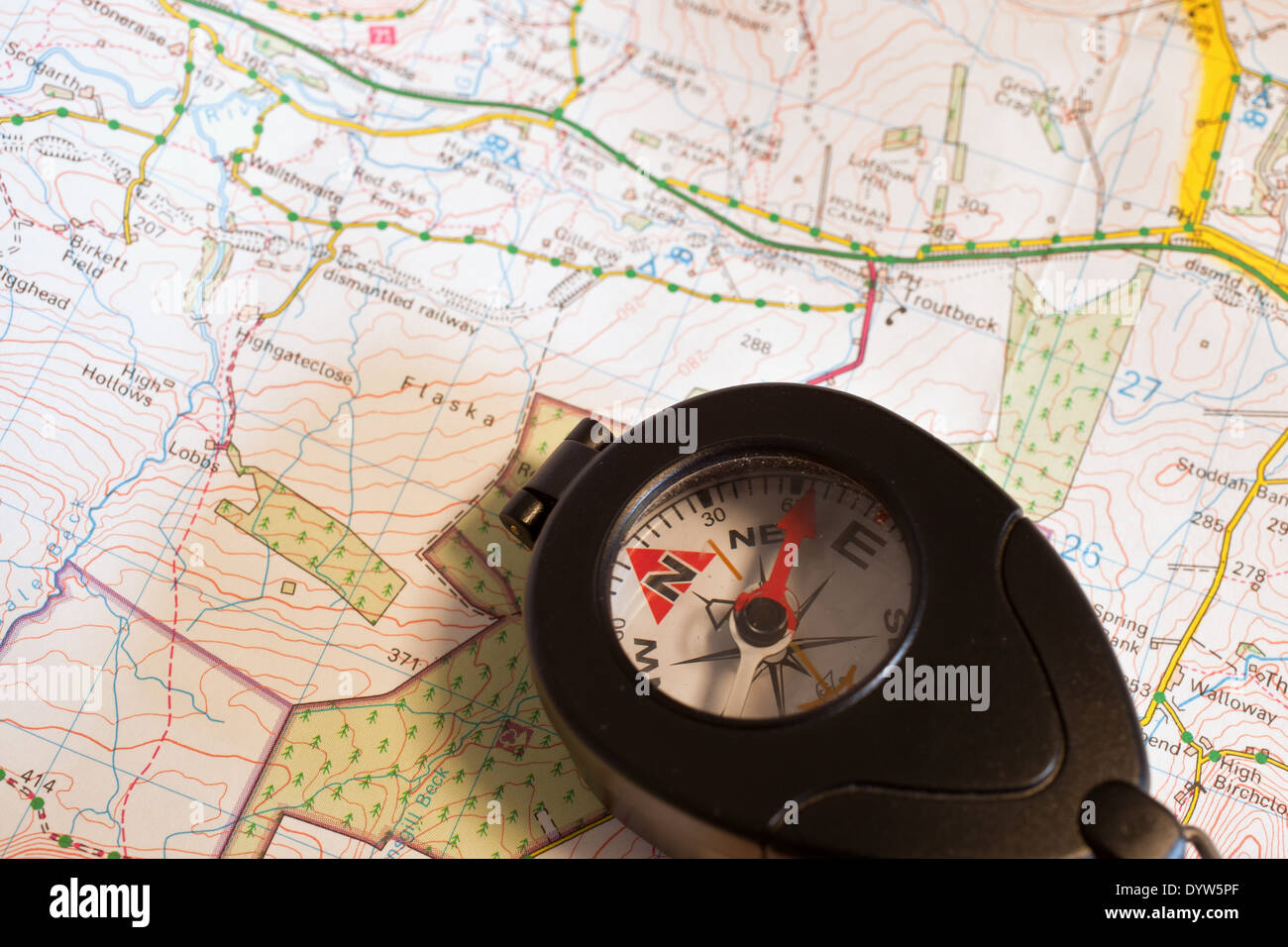Map and compass Stock Photo - Alamy