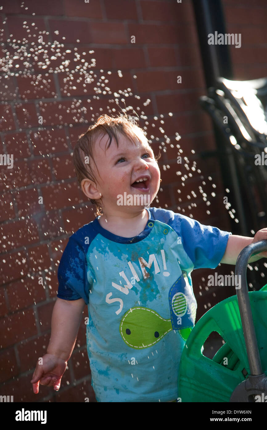 Soaking wet boy hi-res stock photography and images - Alamy