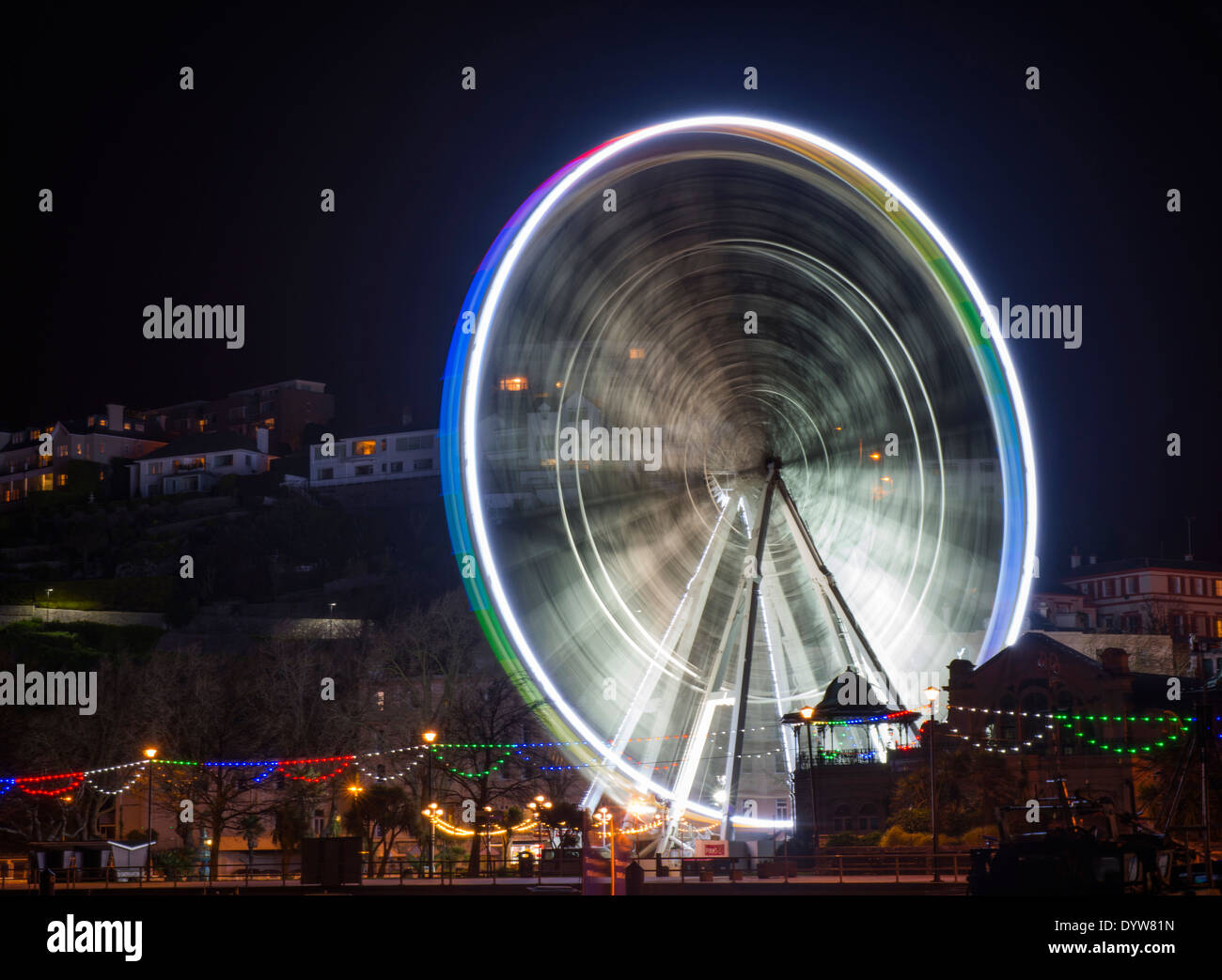 The big wheel lit up at night in Torquay, Devon England UK Stock Photo ...
