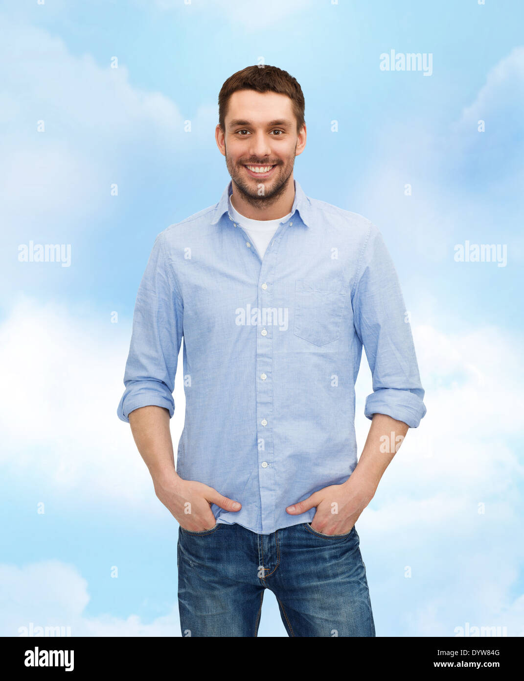 Beautiful man standing smiling hi-res stock photography and images - Alamy