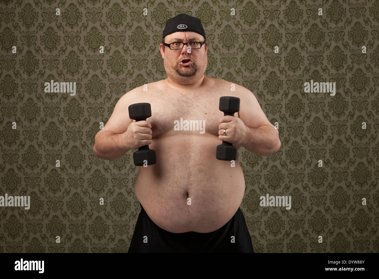 Overweight male exercises to get fit and healthy Stock Photo - Alamy