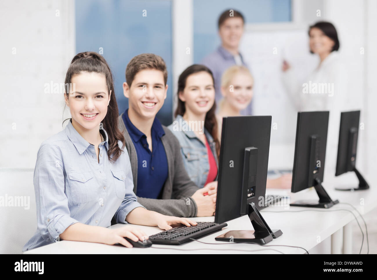 students with computer monitor at school Stock Photo - Alamy