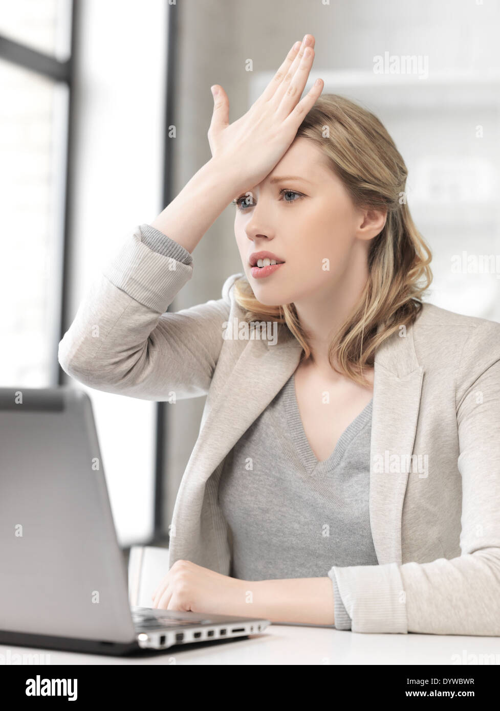 stressed woman with laptop computer Stock Photo - Alamy
