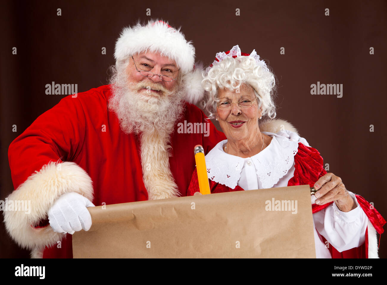 color, horizontal image of the real Santa and Mrs Claus writing on the ...