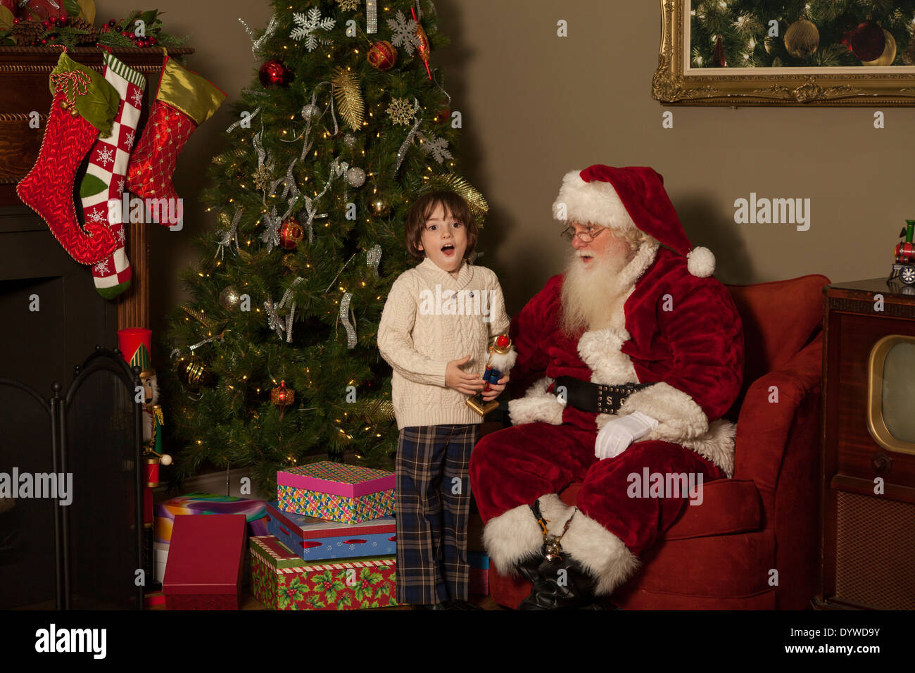 color image of a young boy excited to meet the real Santa Stock Photo ...