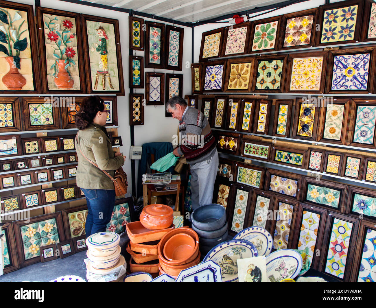 Salesman in Aveiro selling traditional paintings with Azulejo tiles ...