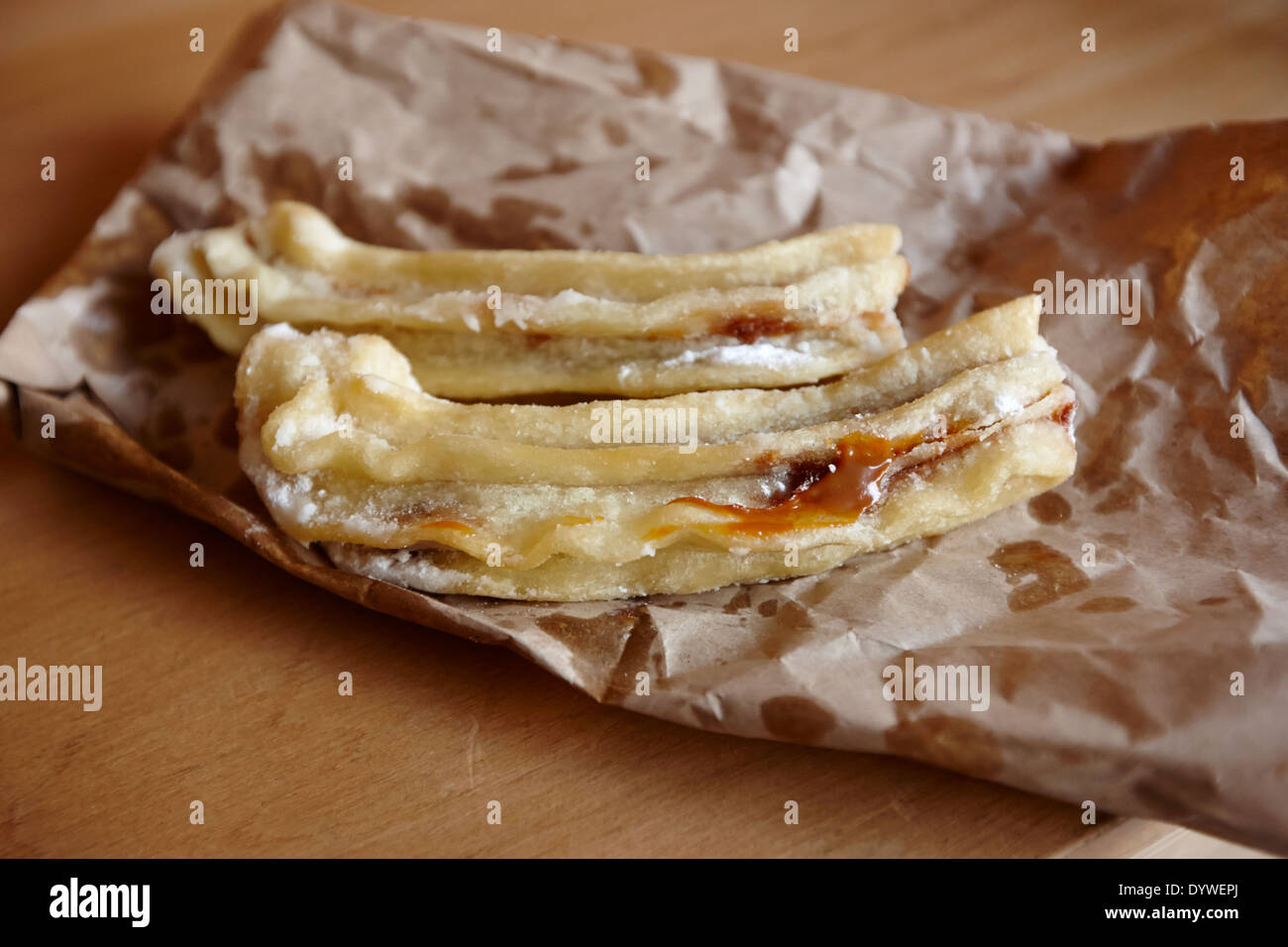 chilean churros with fudge sauce Stock Photo - Alamy