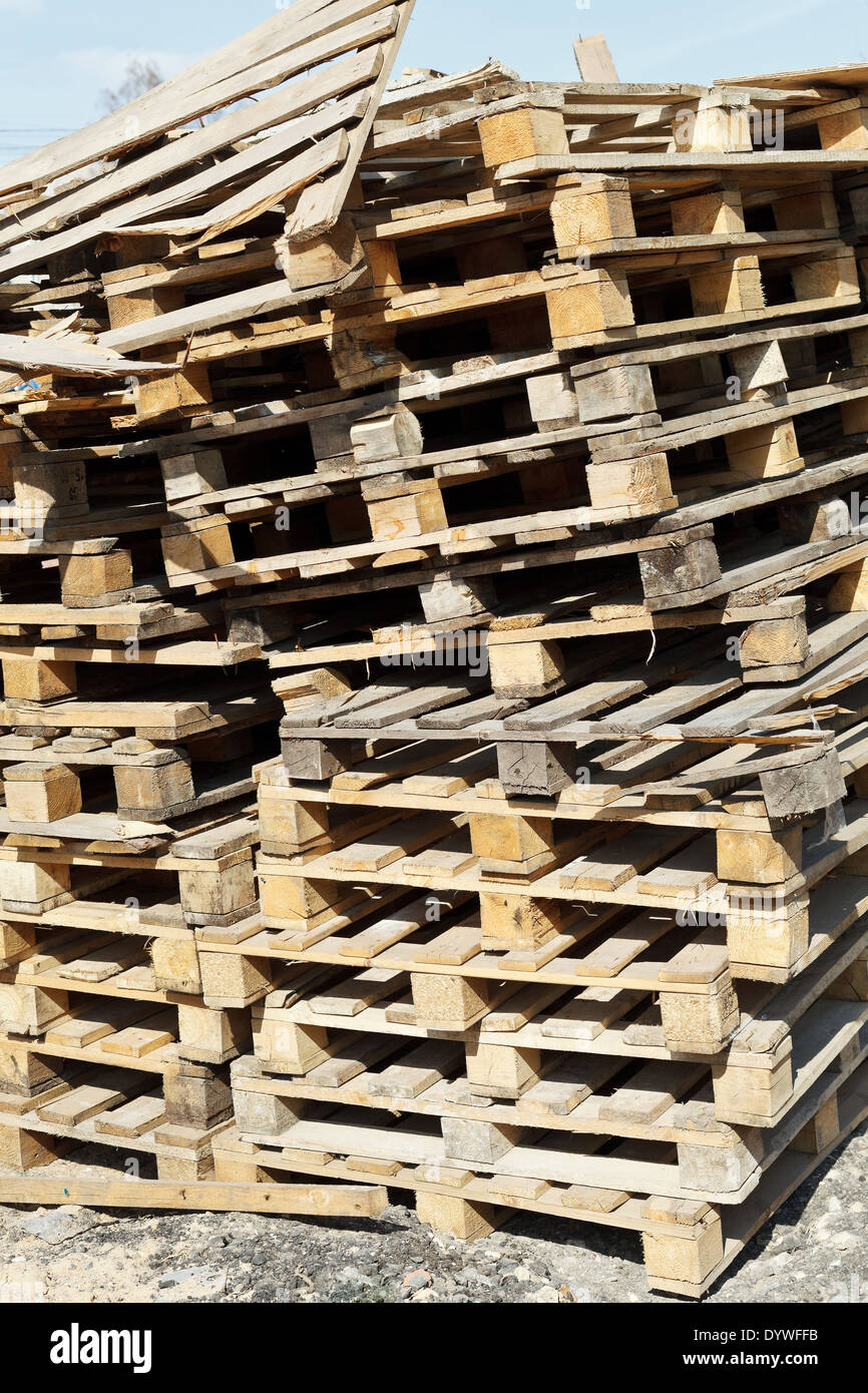stack of empty wooden pallets in warehouse yard outdoors Stock Photo ...