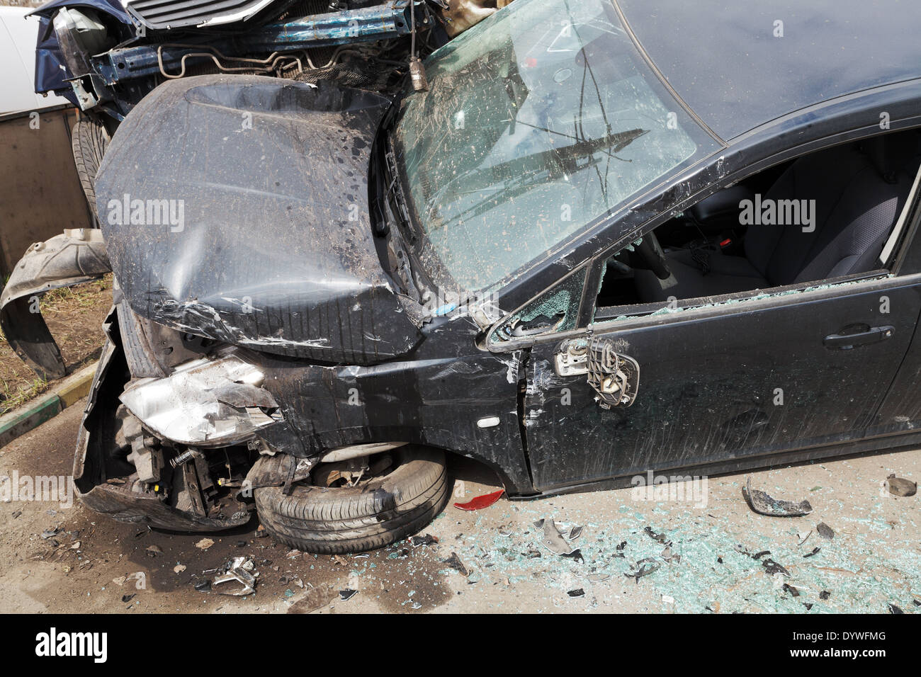 car broken during road accident on urban street Stock Photo - Alamy