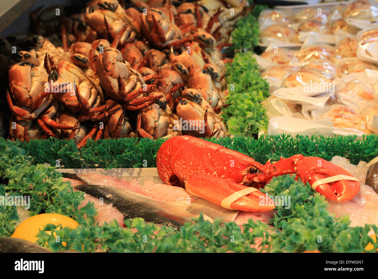A sea food counter displaying Lobster and edible brown crab Stock Photo ...