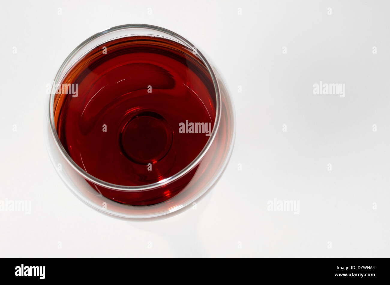 High angle viewpoint take of a glass of red wine Stock Photo - Alamy